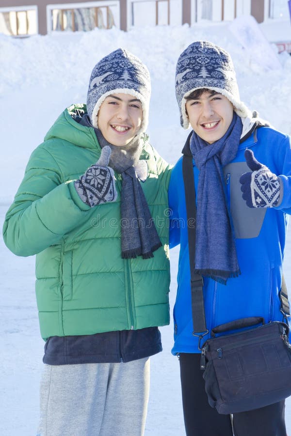 Happy Twins Enjoying in Snow Stock Image - Image of snow, smiling: 83685205