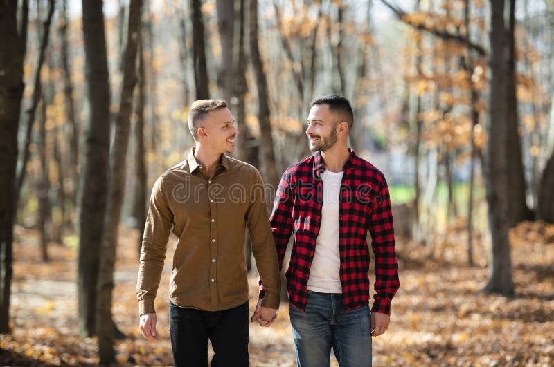 Happy Two Men Couple in Autumn Park Stock Photo - Image of woods, walk ...