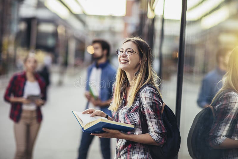 University Student Going on a Class at the University and Looking at ...