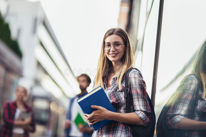 University Student Going on a Class at the University and Looking at ...