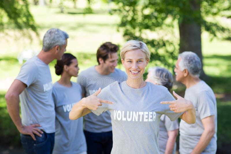 Happy Volunteer Blonde Smiling at the Camera Stock Image - Image of ...