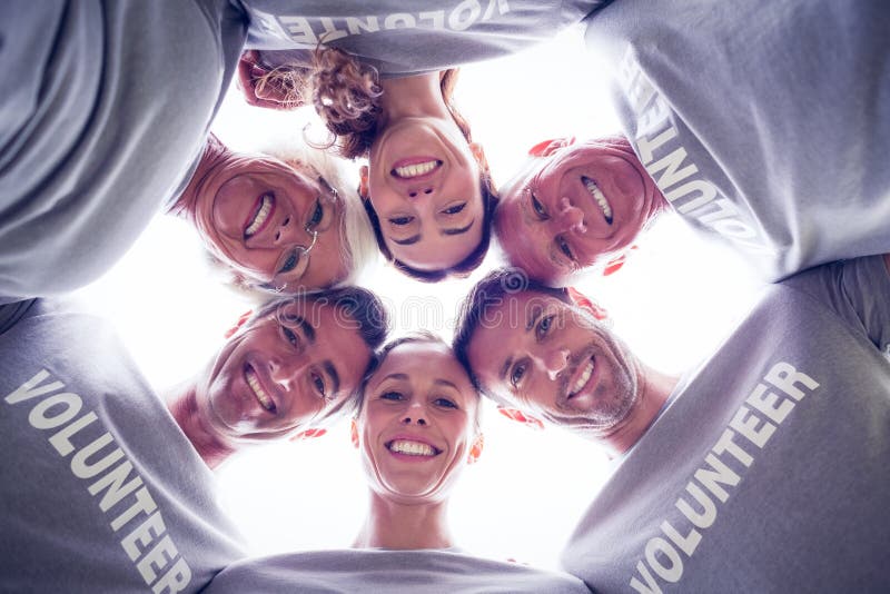 Happy Volunteer Family Looking Down at the Camera Stock Photo - Image ...