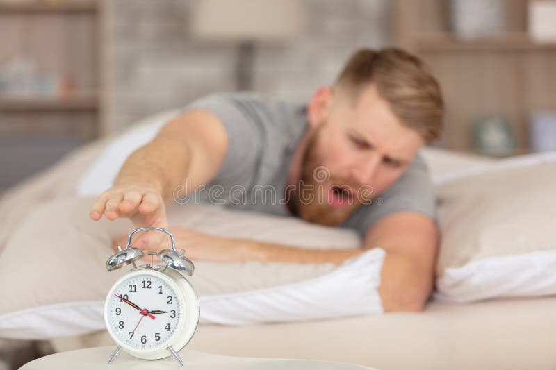 Happy Wake Up Man Lying on Bed Stock Photo - Image of reaching ...