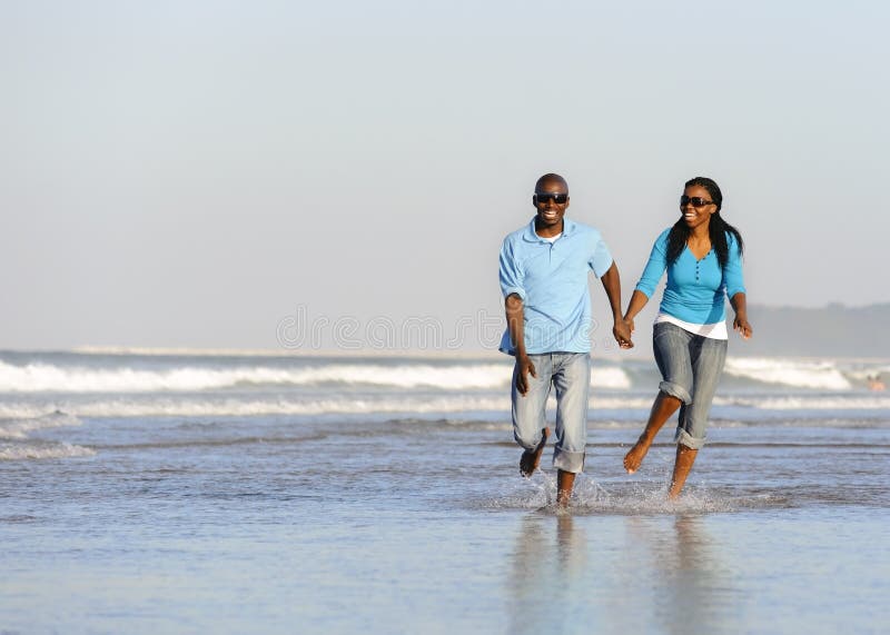 Happy walking couple stock photo. Image of ocean, pretty - 14907950