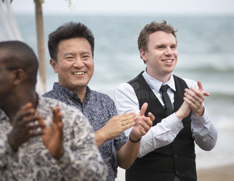 Happy Wedding Guests at the Beach Stock Image - Image of outdoor, group ...