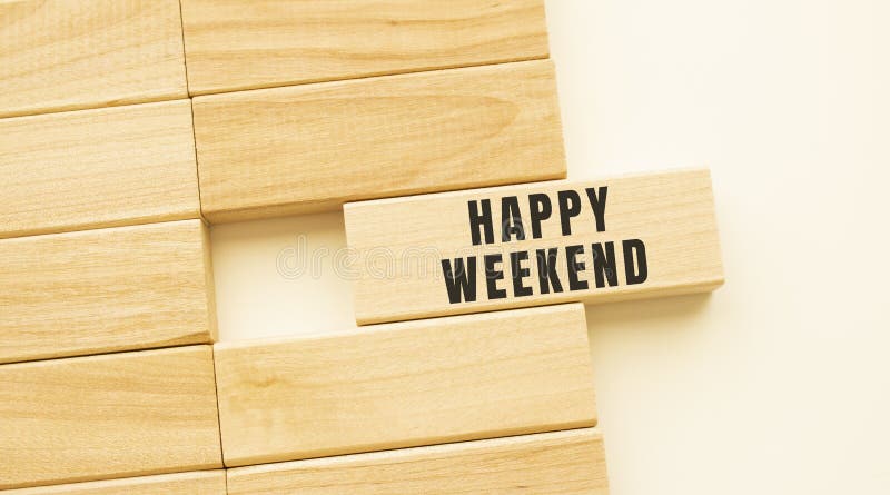 HAPPY WEEKEND Text on a Strip of Wood Lying on a White Table. Stock ...