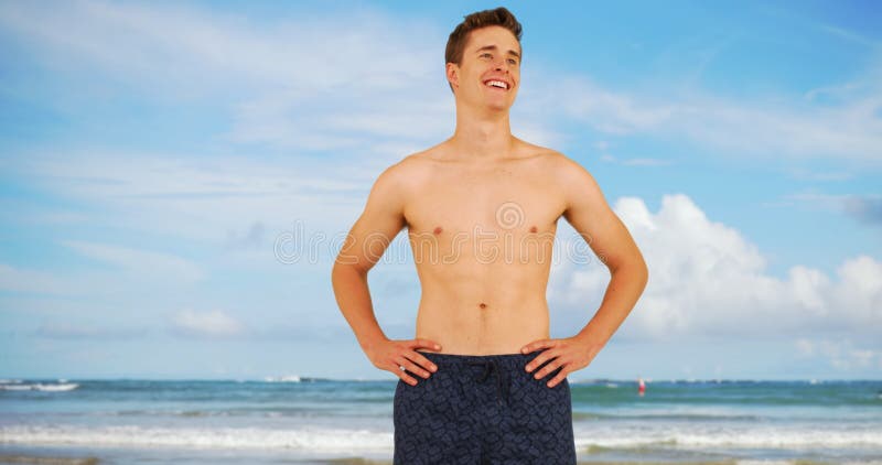 Happy White Guy Standing Relaxed at Cloudy Beach. Stock Image - Image ...