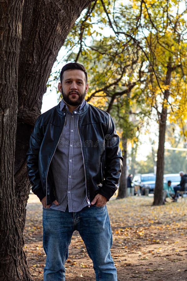 Bearded Man in Leather Jacket Under Yellow Autumn Tree Stock Photo ...