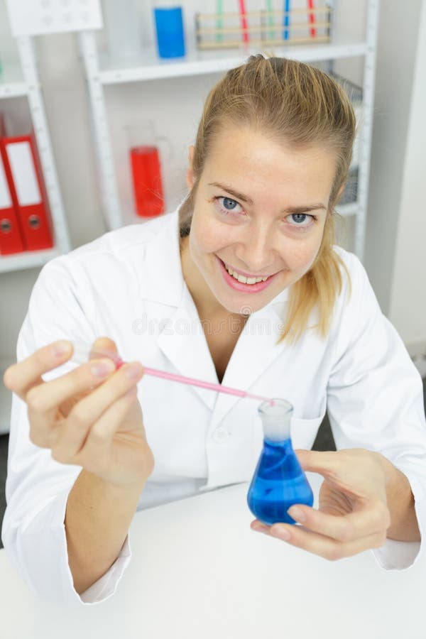 Happy Woman with Blue Liquid in Pipette Stock Photo - Image of chemical ...