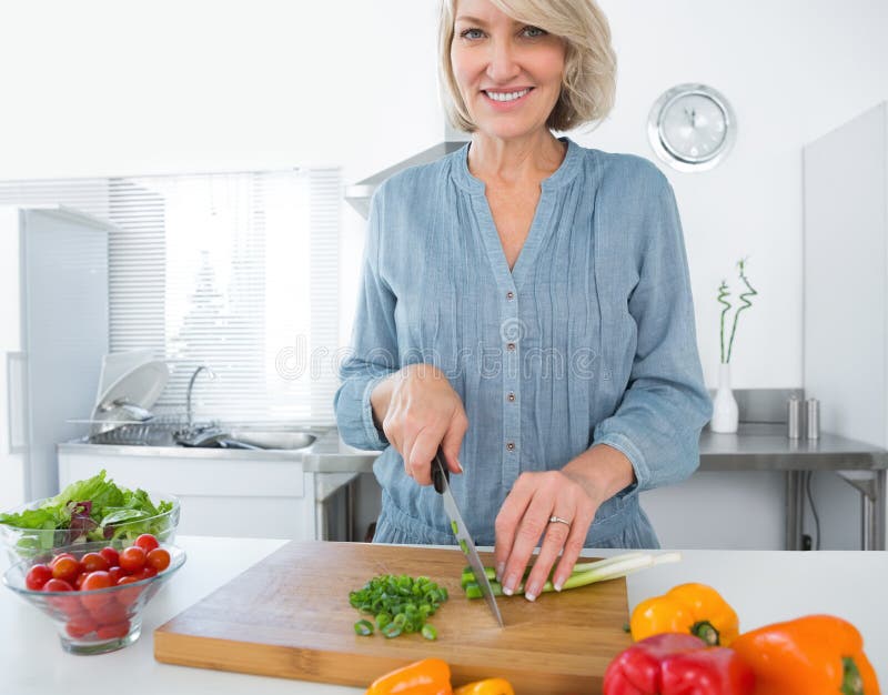 Happy Woman Chopping Vegetables Stock Photo - Image of caucasian ...