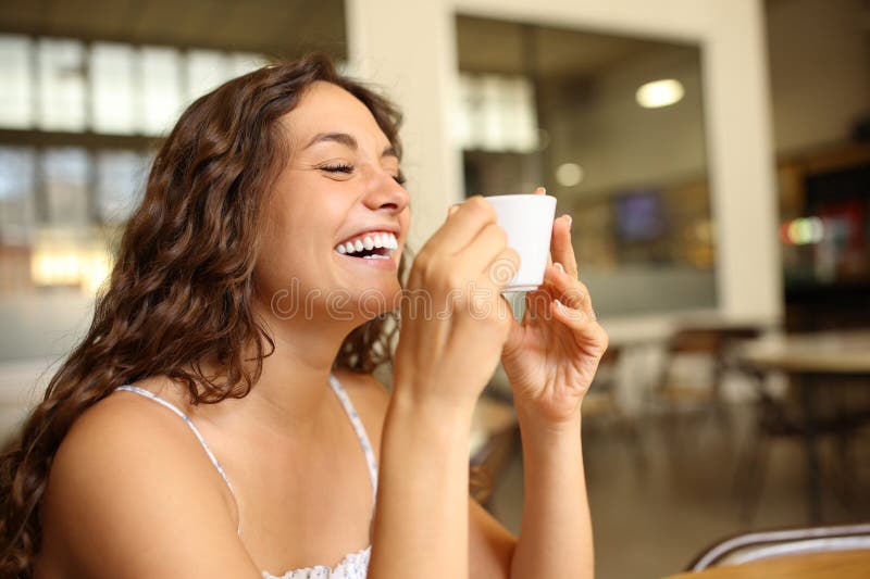 Happy Woman in a Coffee Shop Drinking and Laughing Stock Photo - Image ...
