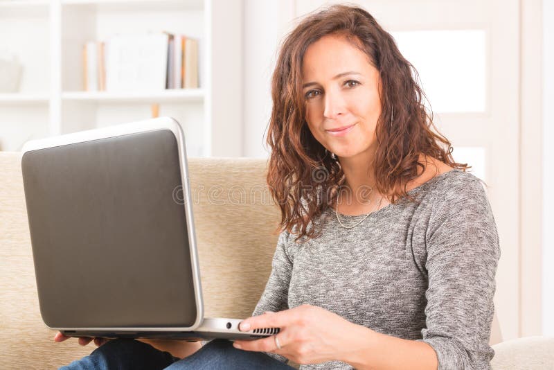 Happy woman with computer stock image. Image of cheerful - 37746041