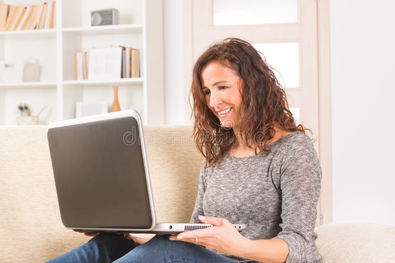 Happy woman with computer stock image. Image of home - 37746043