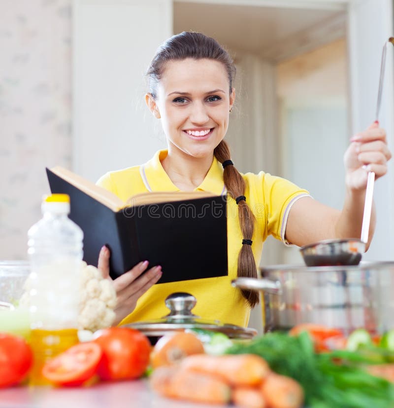 Young woman cooking stock image. Image of dinner, health - 25452379
