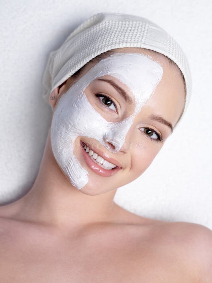Happy Woman with Cosmetic Mask Stock Photo - Image of face, salon: 19069846