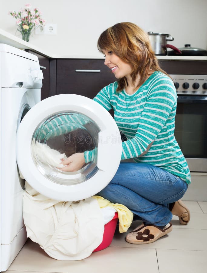 Happy Woman Doing Laundry with Washing Machine Stock Image - Image of ...