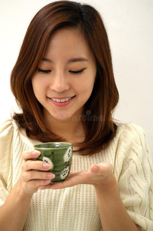 Happy woman drinking tea stock image. Image of tasting - 28714983