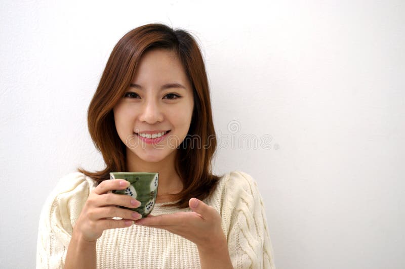 Happy woman drinking tea stock image. Image of green - 28715071