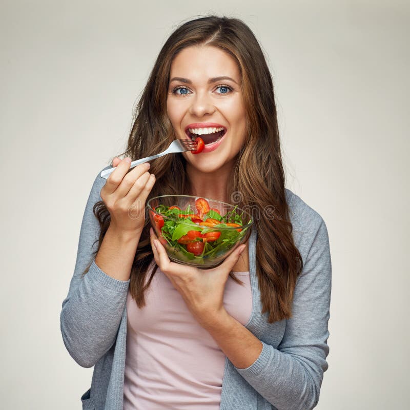 Happy Woman Eating Salad From Glass Bowl With Fork Stock Image Image