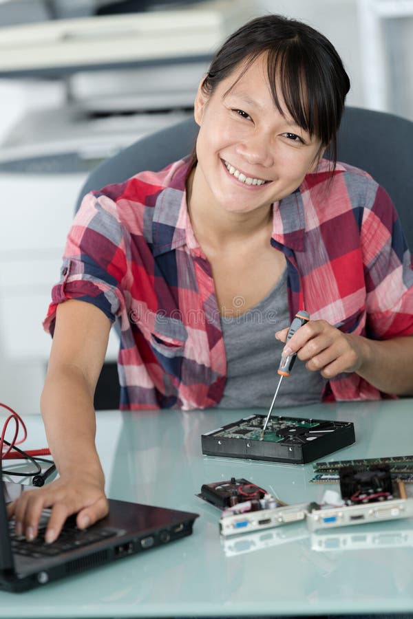 Happy Woman Fixing External Hard Drive Stock Photo - Image of tech ...