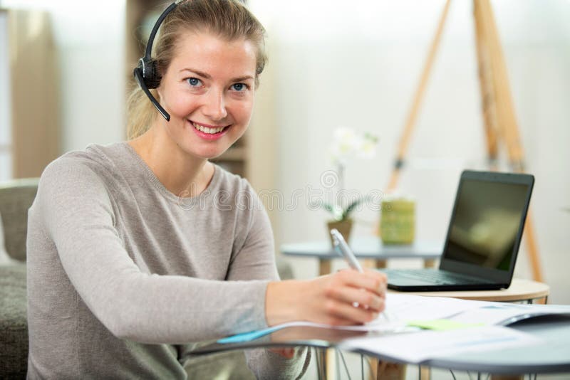 Happy Woman with Headset Working on Laptop Computer Stock Image - Image ...