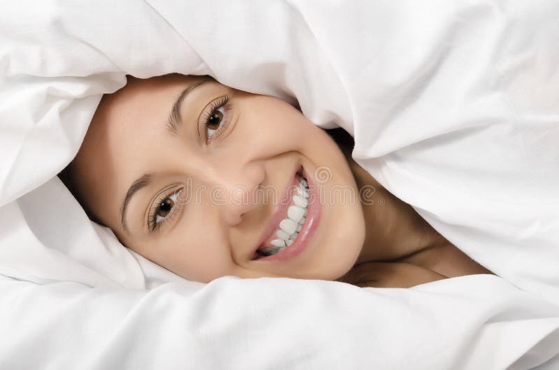 Happy Woman Hiding Under the Duvet Stock Image - Image of adult, waking ...