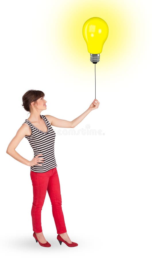 Happy Woman Holding a Light Bulb Balloon Stock Photo - Image of jump ...