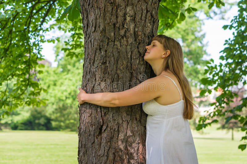 Happy Woman Hugging a Tree in the Forest Stock Image - Image of female ...