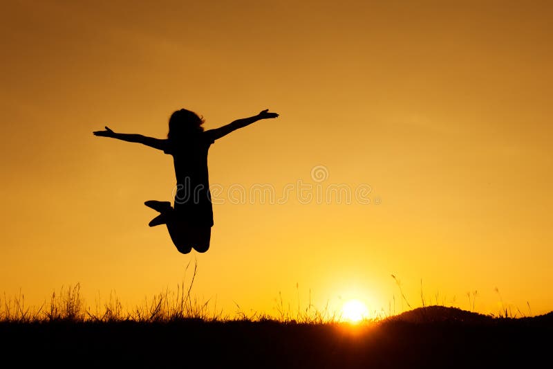 Happy Woman Jumping and Sunset Silhouette Stock Image - Image of hold ...