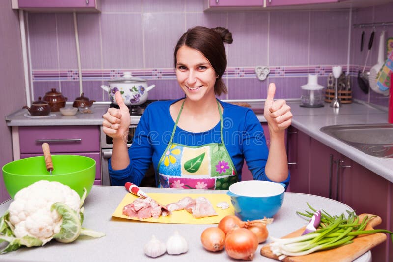 Happy woman in the kitchen stock photo. Image of healthy - 68986776