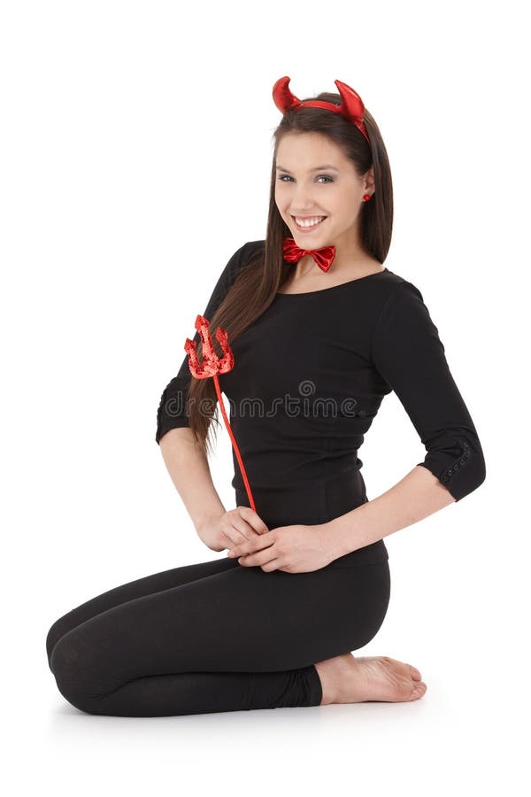 Happy Woman Kneeling in Devil Costume Stock Photo - Image of american ...