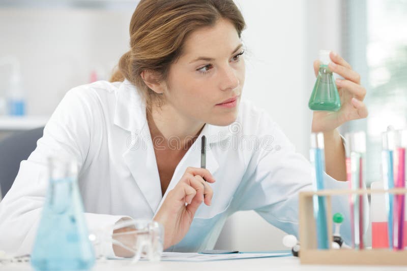 Happy woman in lab stock image. Image of microbiology - 244998083