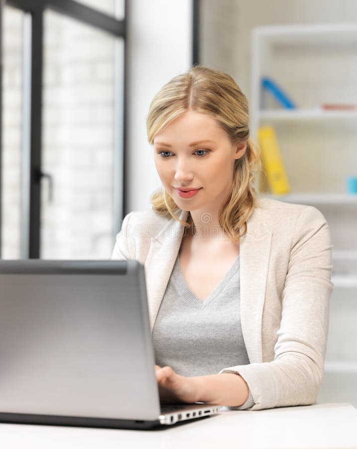 Young Woman Working with Computer in Cafe Stock Photo - Image of ...