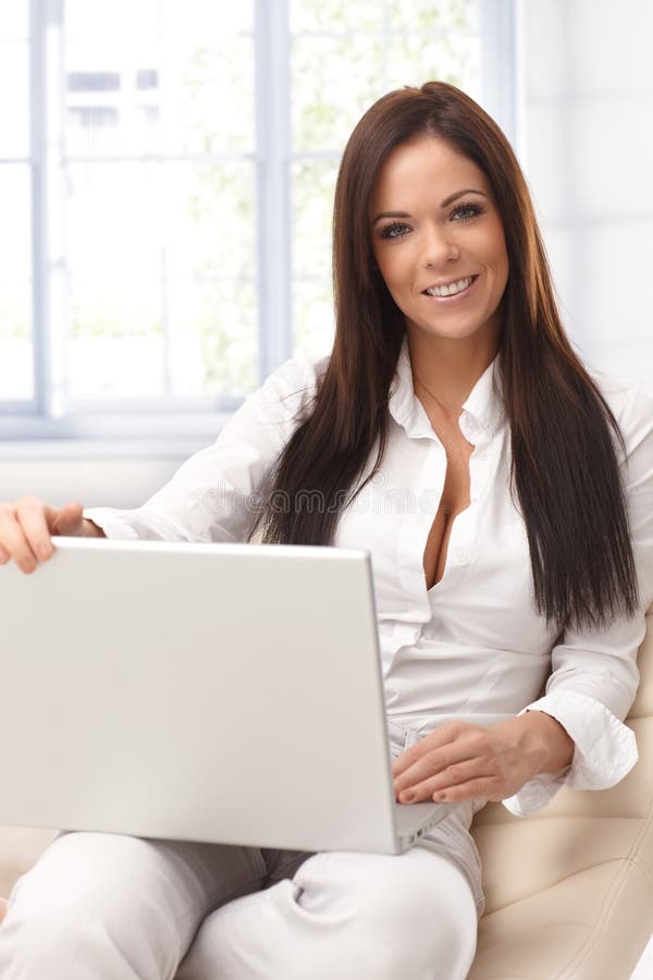 Happy woman with laptop stock image. Image of camera - 40569427