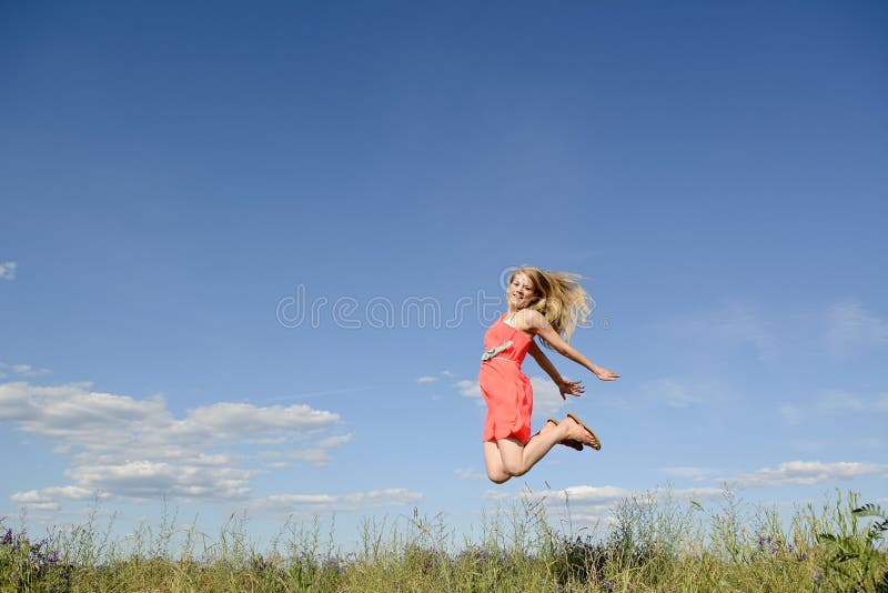 Happy woman leaping stock image. Image of jump, bounce - 89500243