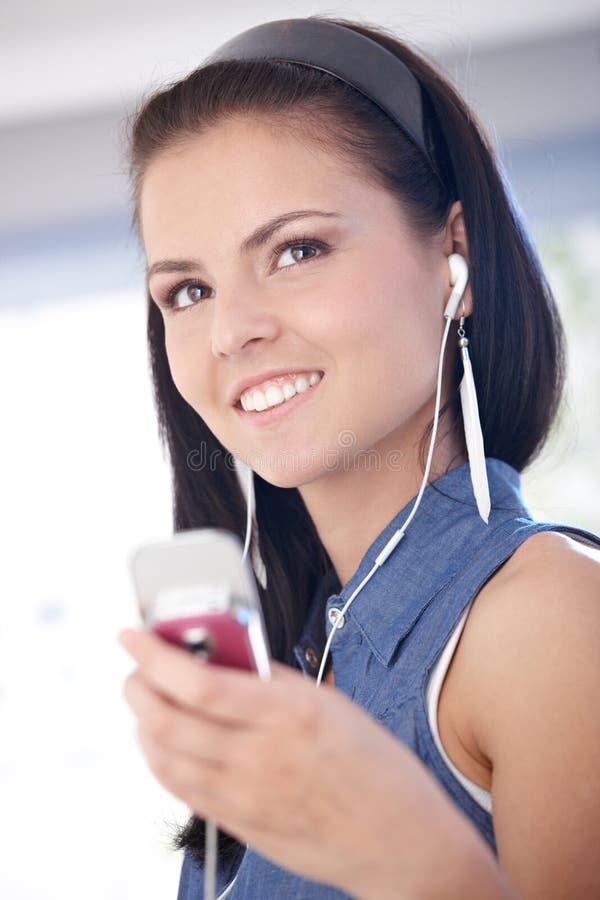 Happy Woman Listening Music through Mobile Stock Image - Image of ...