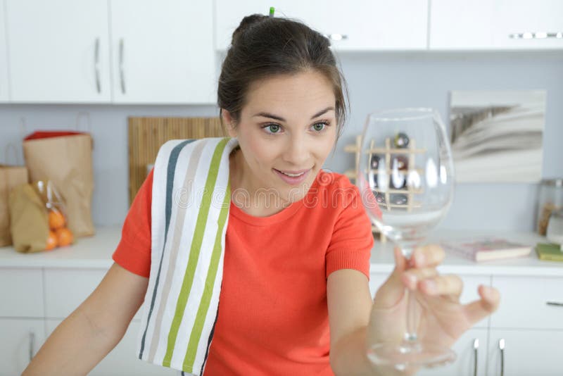 Happy Woman Looking at Clean Glass Stock Image - Image of utensil ...