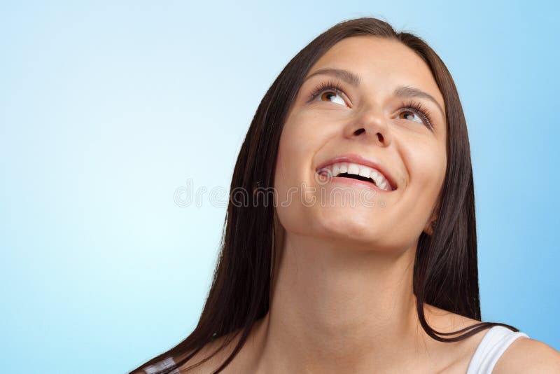 Happy woman looking up stock photo. Image of dental, copyspace - 75836632