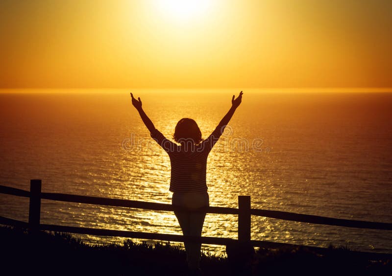 Happy Woman Open Arms Under the Sunset at Seaside Stock Photo - Image ...