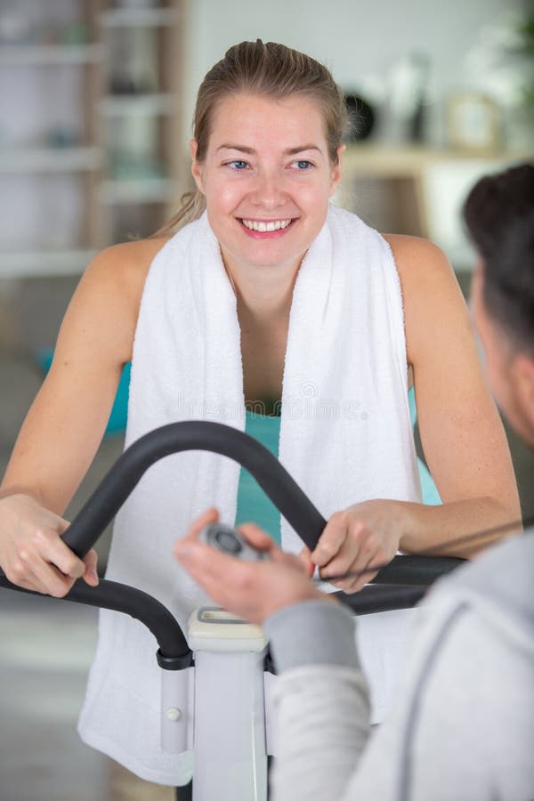 Happy Woman with Personal Trainer Stock Photo - Image of center, ager ...