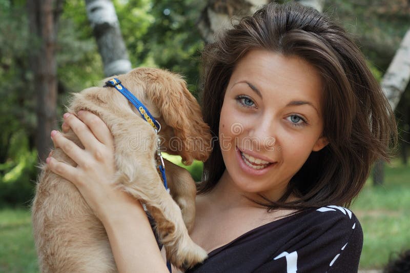 Happy woman with pet dog stock photo. Image of holding - 5620716