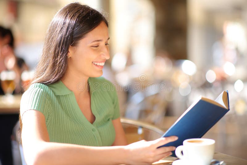 Happy Woman is Reading a Book in a Bar Stock Photo - Image of teen ...