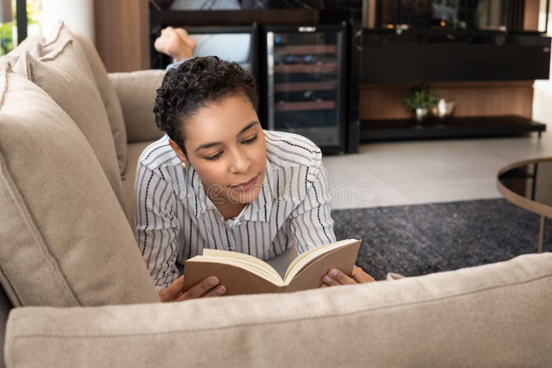 Woman Reading Book and Enjoying Weekend in the Couch Stock Photo ...