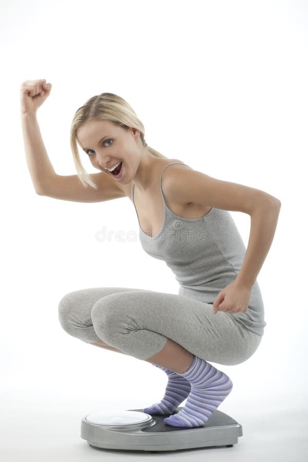 Cheering Woman on Scale stock photo. Image of black, happy - 16787408