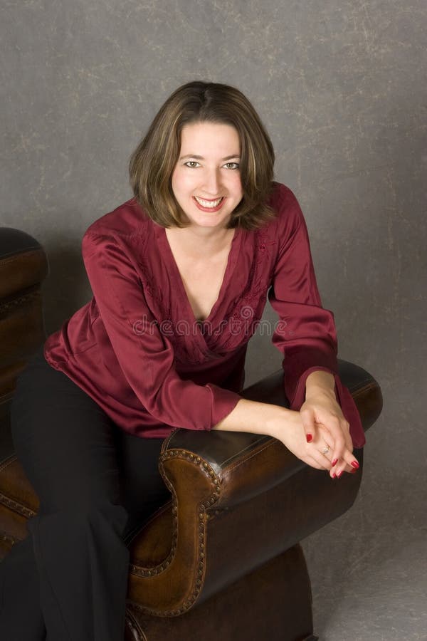 Happy woman seated stock photo. Image of beauty, cheerful - 7535830