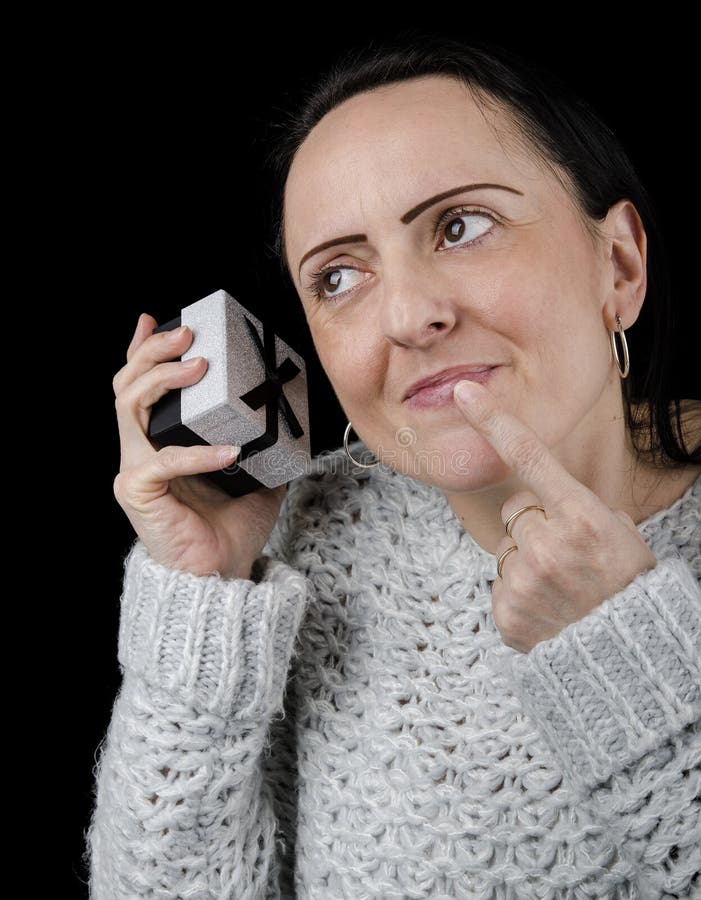 Happy Woman Shaking Gift Box Stock Photo - Image of excited, holding ...