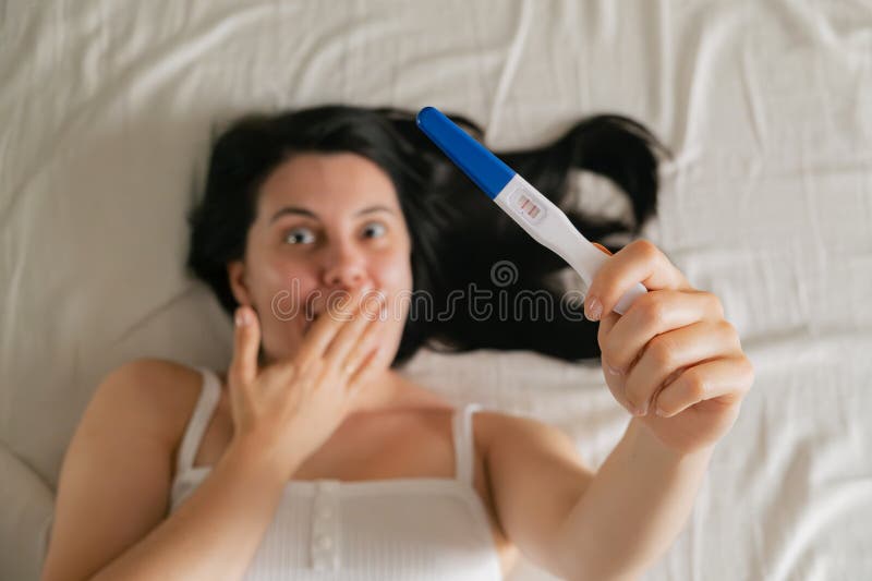 Happy Woman Showing Positive Pregnancy Test Stock Image - Image of ... Happy Woman Showing Positive Pregnancy Test Stock Image - Image of ...