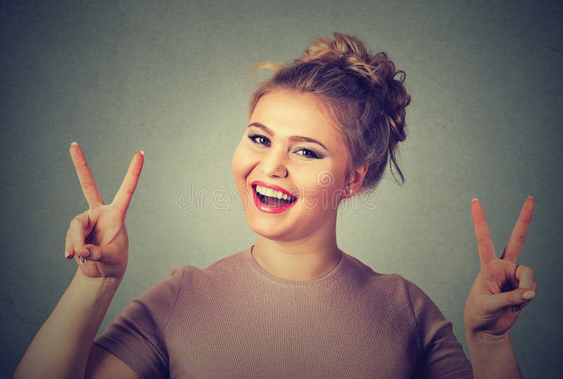Portrait Lovely Happy Girl Showing Victory Or Peace Sign Stock Image