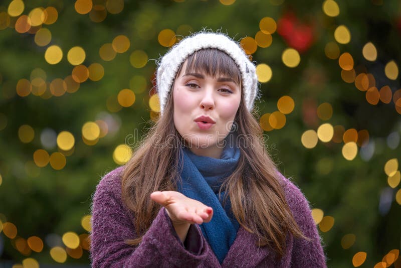 Happy Woman Smiling and Christmas Tree Behind Stock Photo - Image of ...