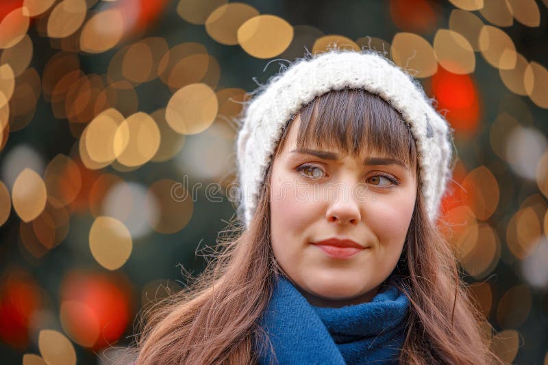 Happy Woman Smiling and Christmas Tree Behind Stock Photo - Image of ...